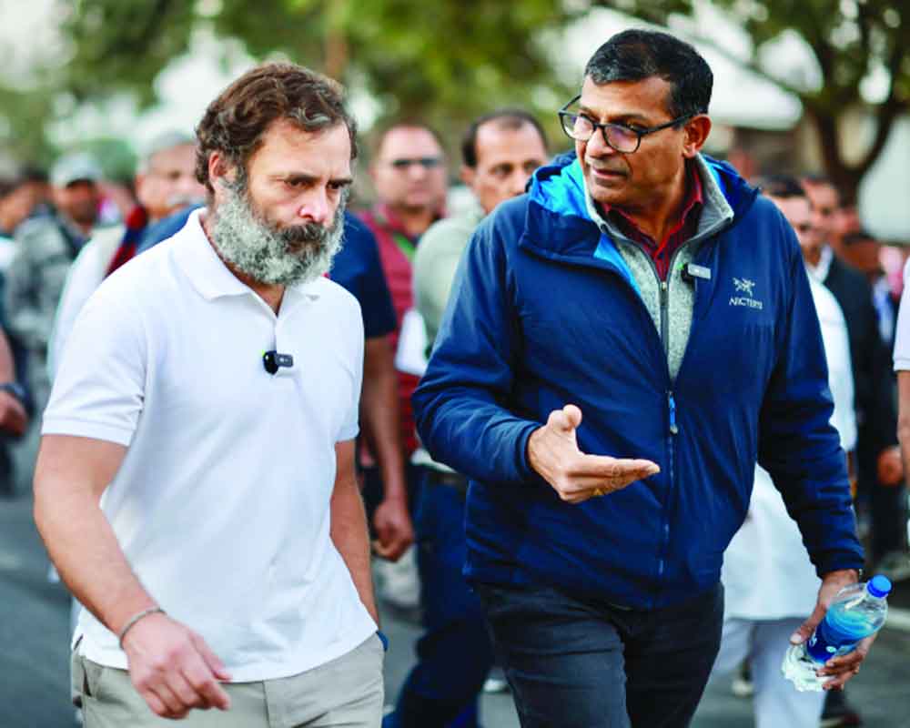 Raghuram Rajan joins Rahulâ€™s yatra; BJP, Cong slug it out