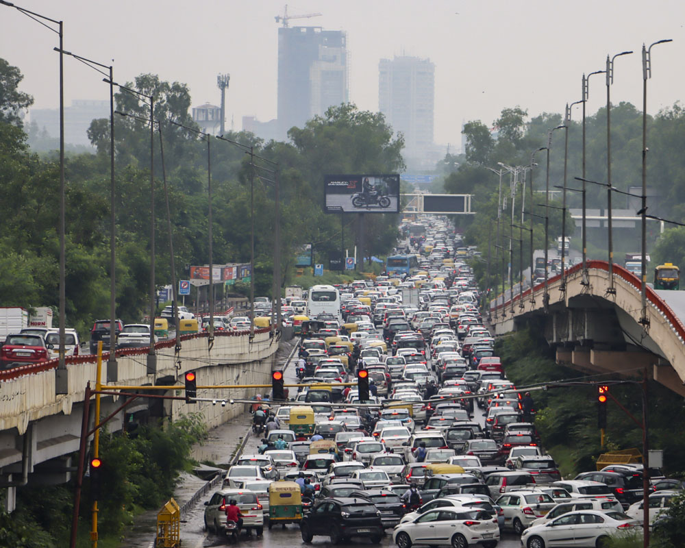 Delhi: Heavy rain causes waterlogging, traffic snarls