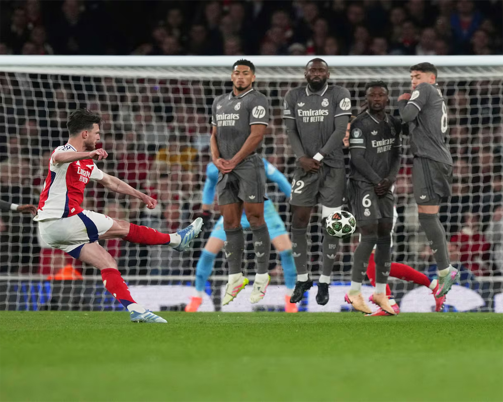 Bend it like Declan: Rice curls home two free kicks as Arsenal beat Real Madrid 3-0 in CL quarters