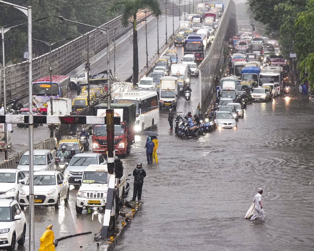 Incessant rainfall causes waterlogging in parts of Mumbai; suburban train services hit