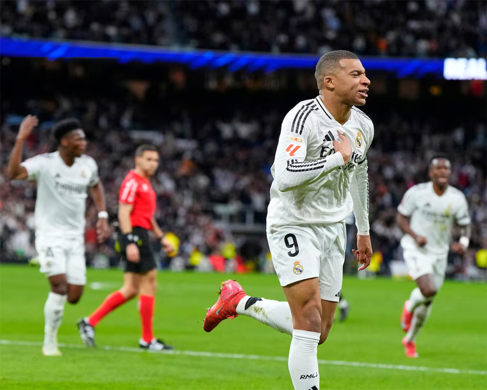 MbappÃ© and VinÃ­cius score as Real Madrid joins Barcelona at top of Spanish league